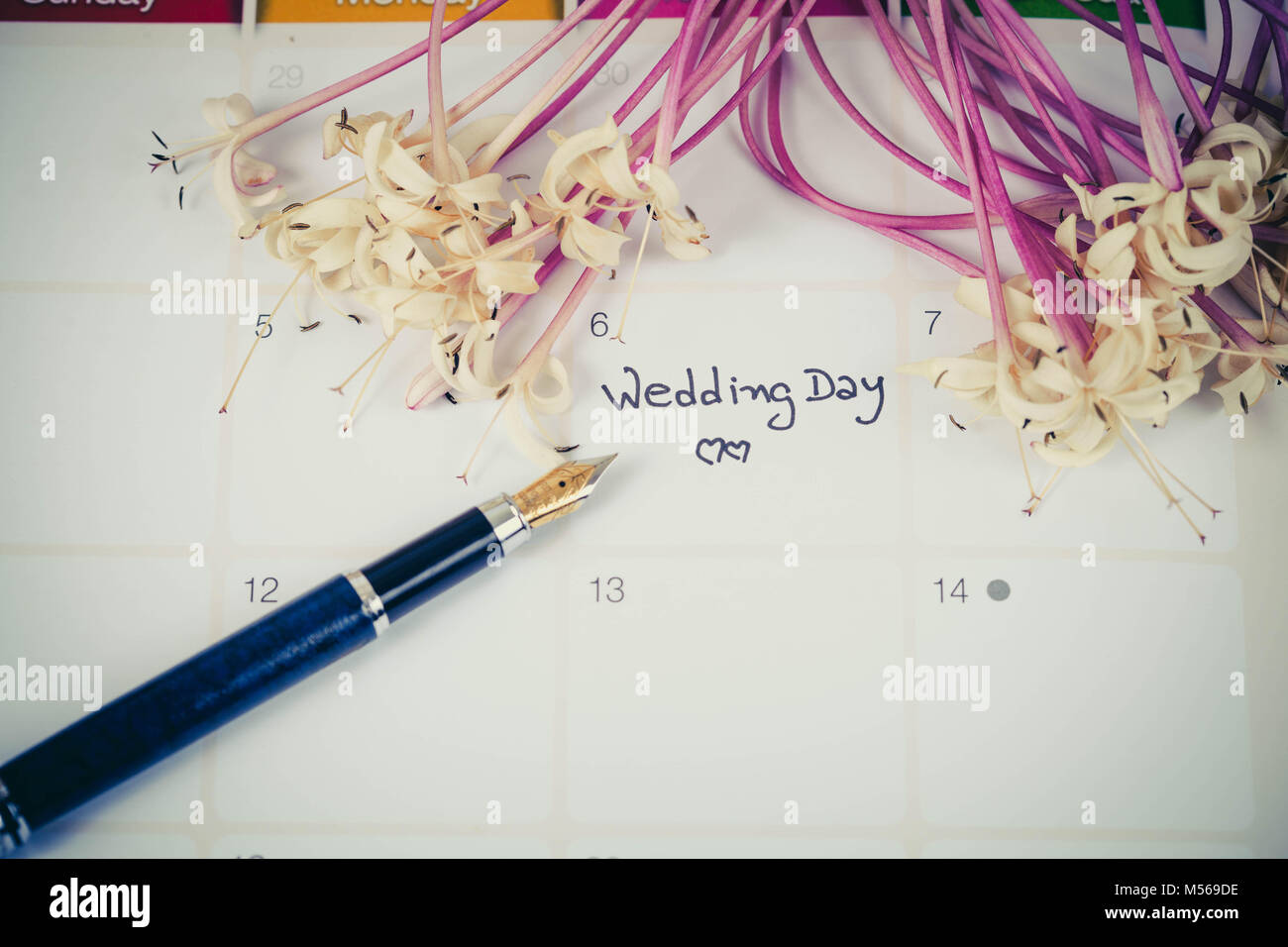Reminder Wedding day in calendar planning and fountain Stock Photo - Alamy