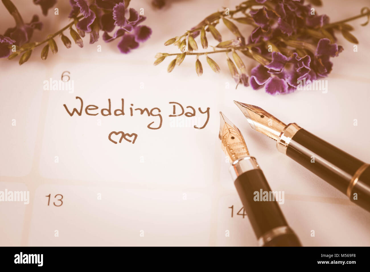 Reminder Wedding day in calendar planning and fountain Stock Photo - Alamy