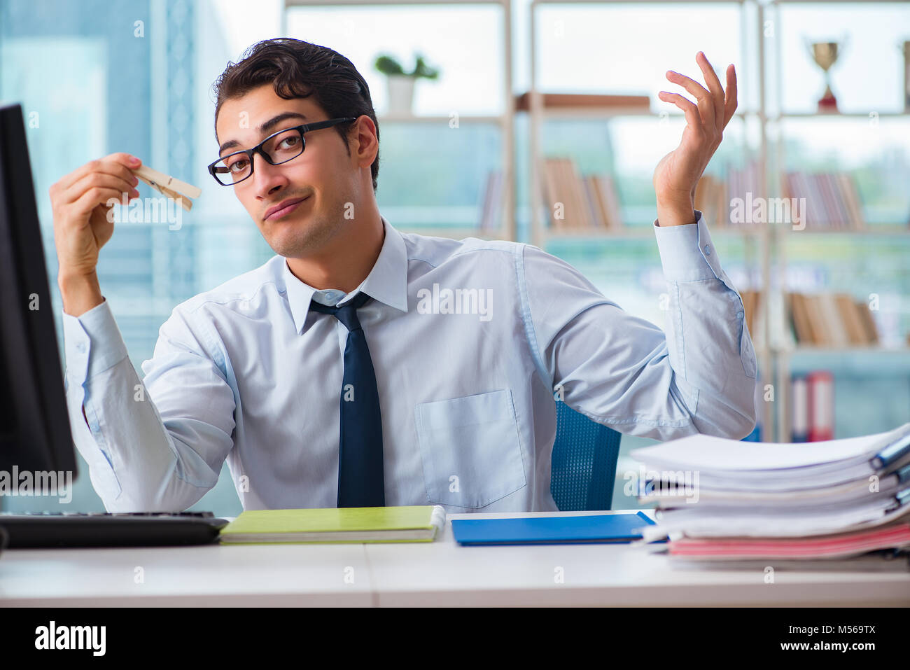 Businessman suffering from excessive armpit sweating Stock Photo - Alamy