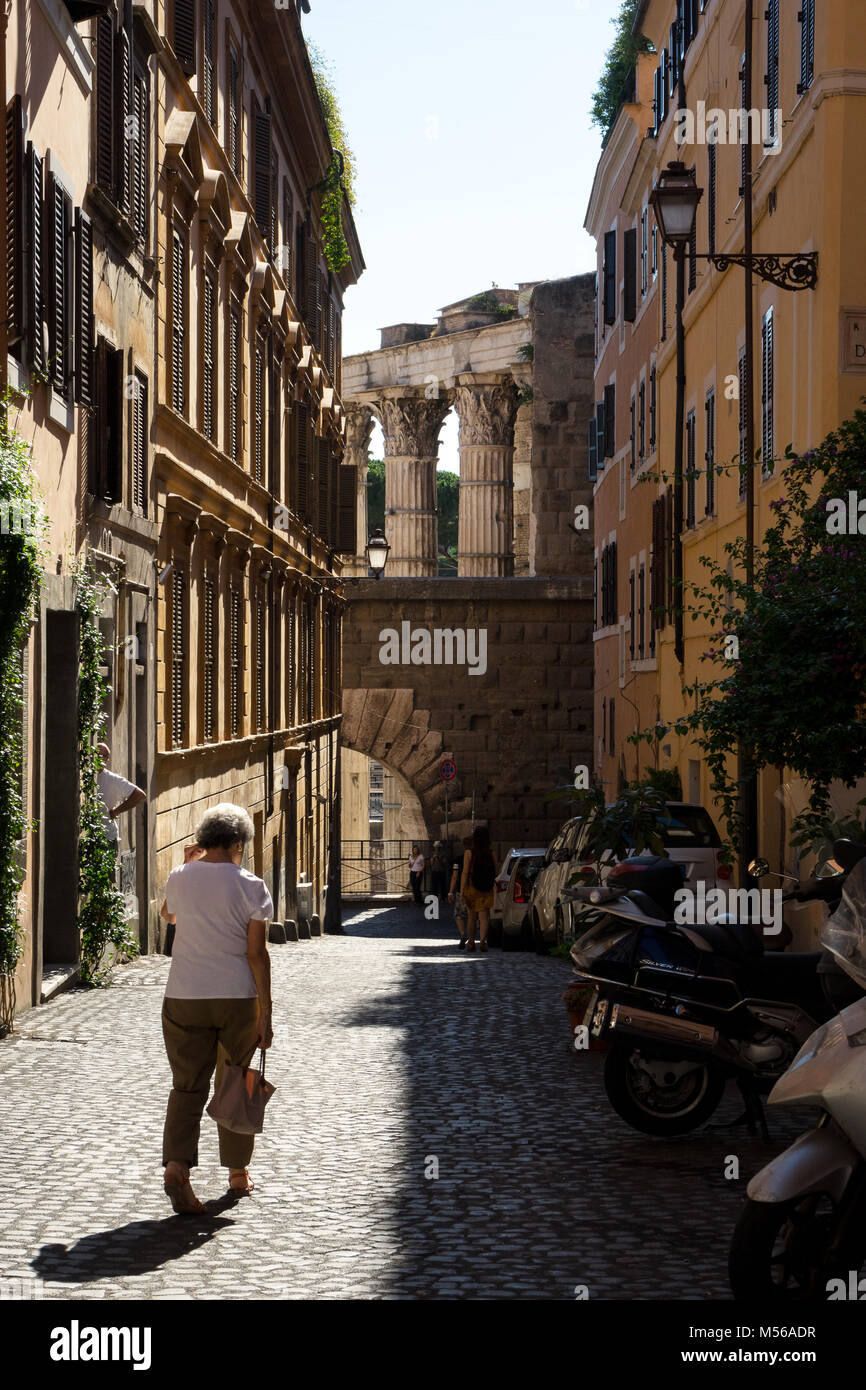 Rome, Italy: The Roman Forum columns overlook Baccina street in Rome ...