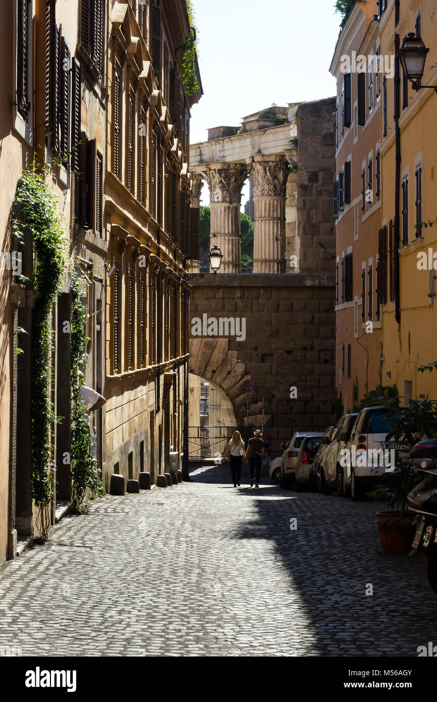Rome, Italy: the Roman Forum columns overlook Baccina street in Rome ...