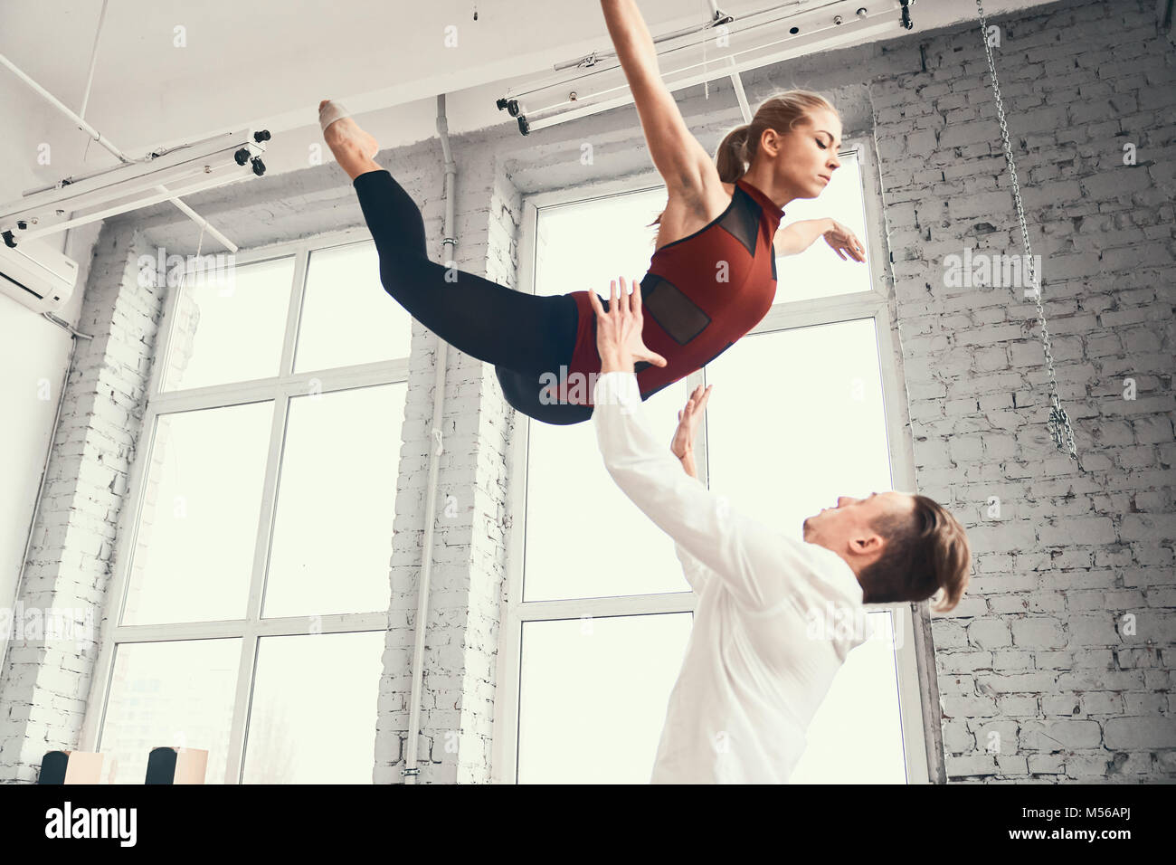 Couple of ballet dancers posing Stock Photo - Alamy