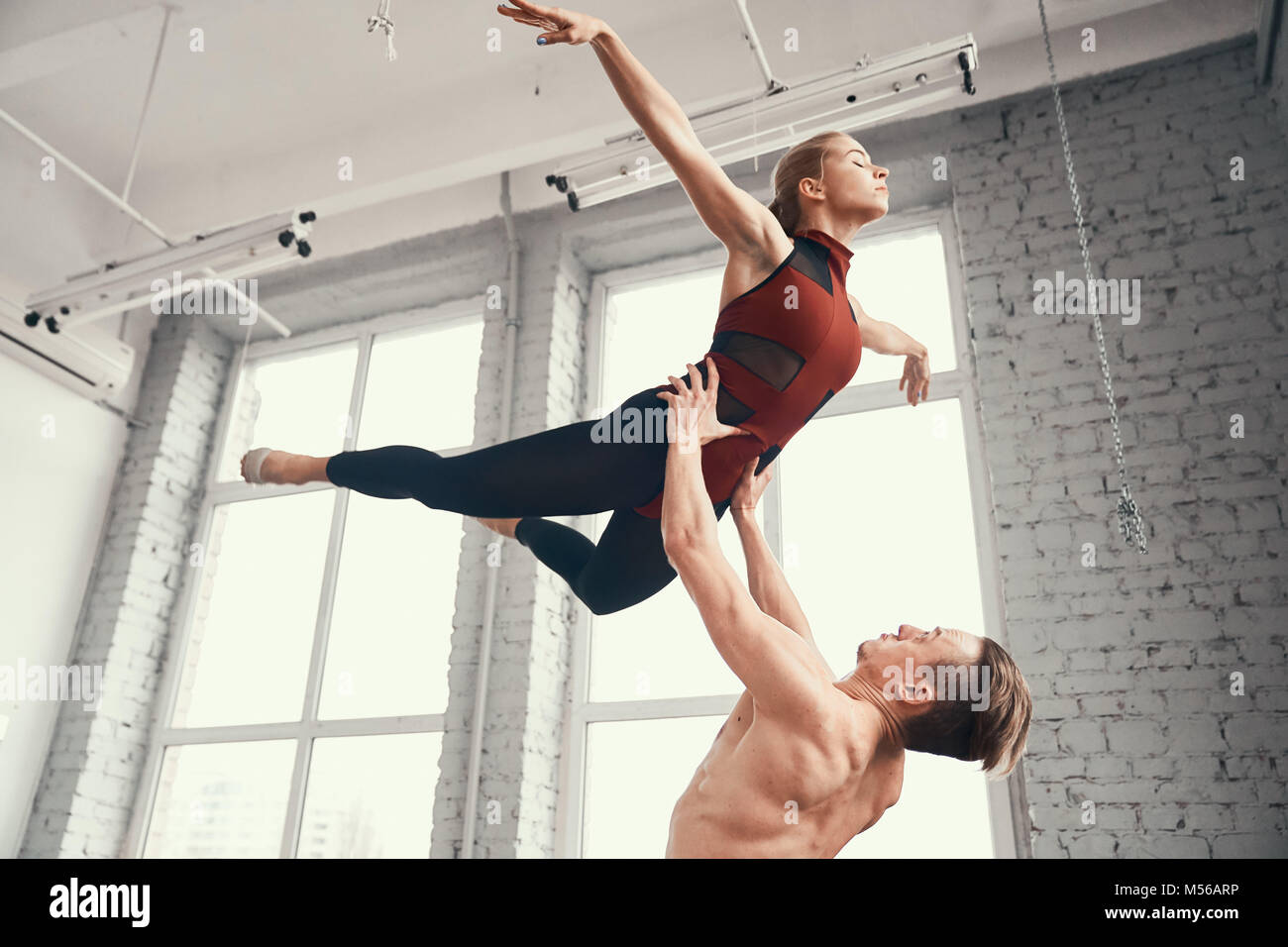 Couple of ballet dancers posing Stock Photo - Alamy