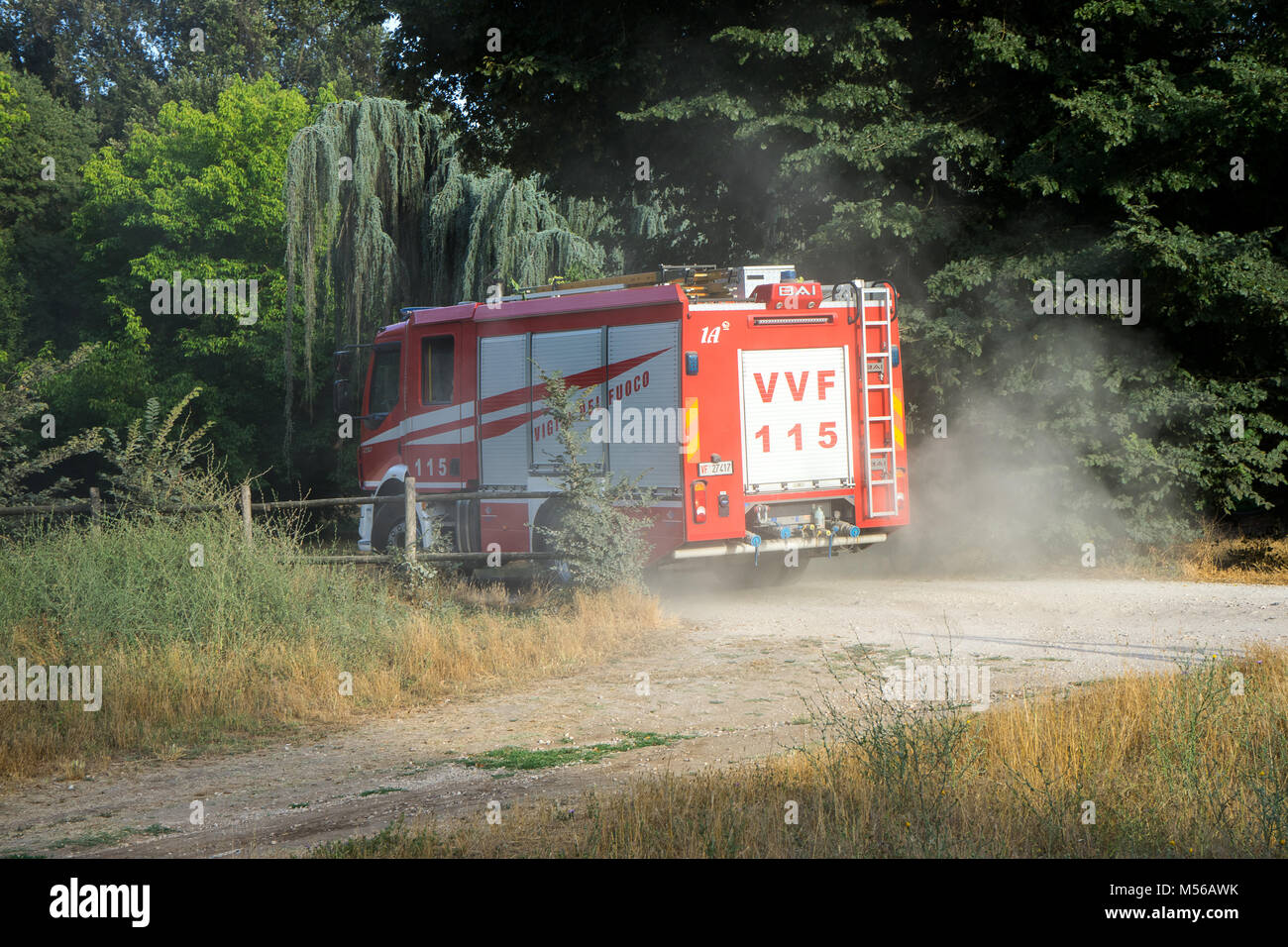 Rome, Italy: Rome fire brigade truck runs along the dirt roads of Villa ...