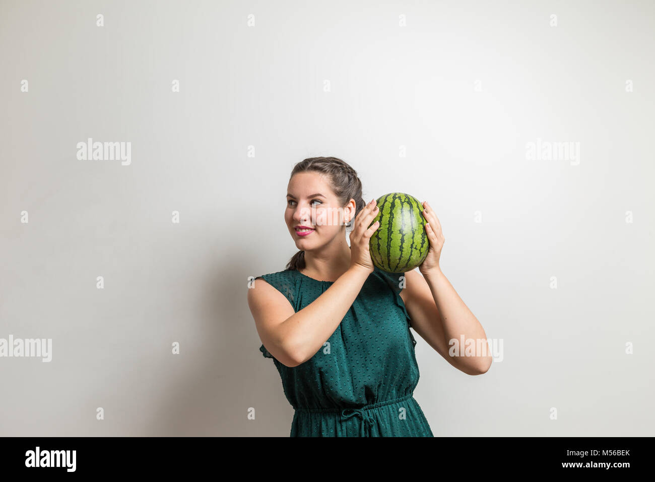 Diet concept happy sporty girl poses with fruit watermelon Stock Photo ...