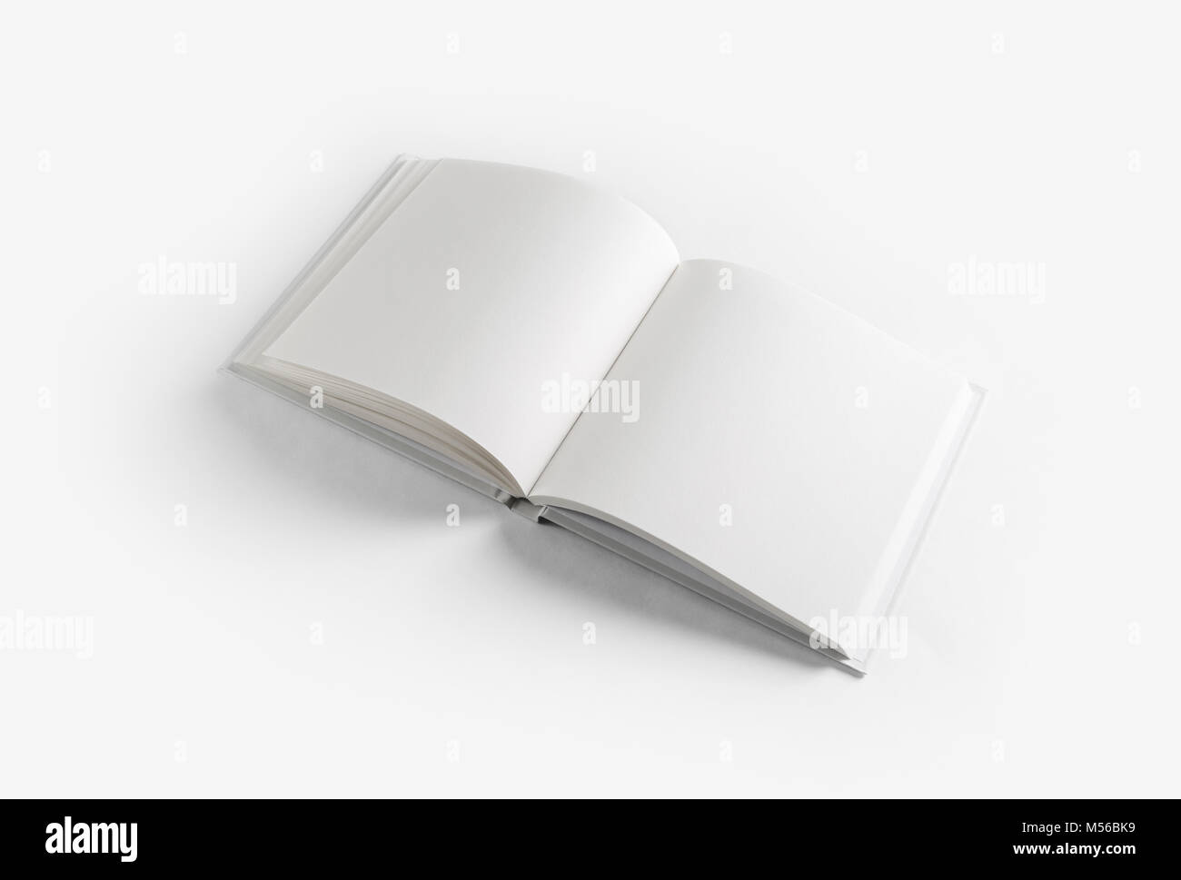 Blank white book Stock Photo - Alamy