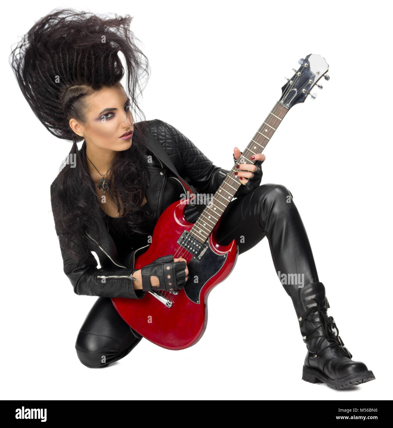 Young woman rock musician isolated Stock Photo - Alamy