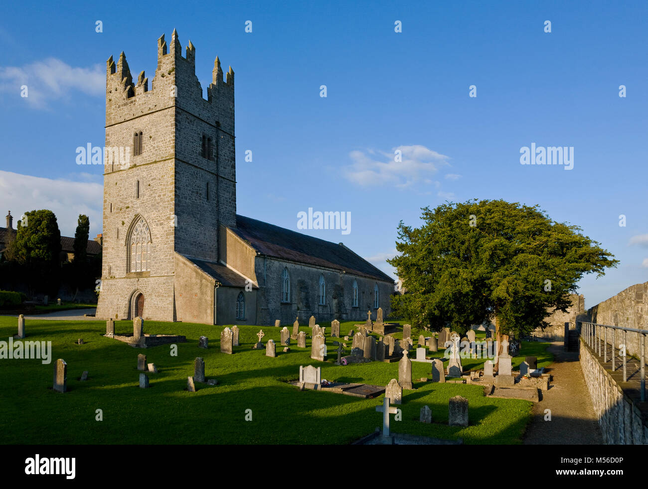 Parish Church and churchyard, sheltered by the town walls (on right ...