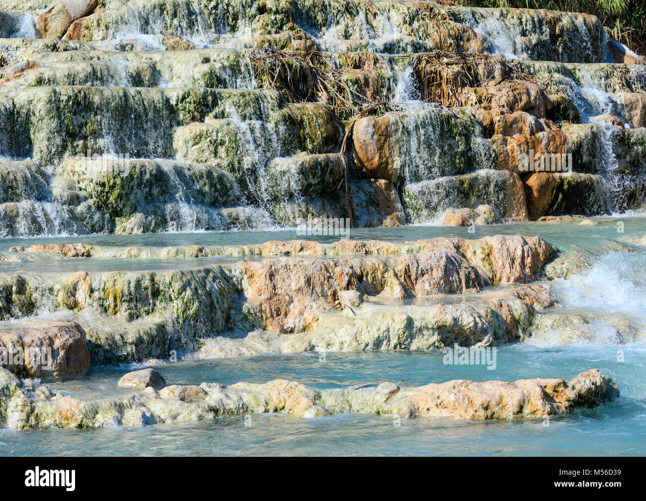Natural spa with waterfalls and hot springs at Saturnia thermal baths ...
