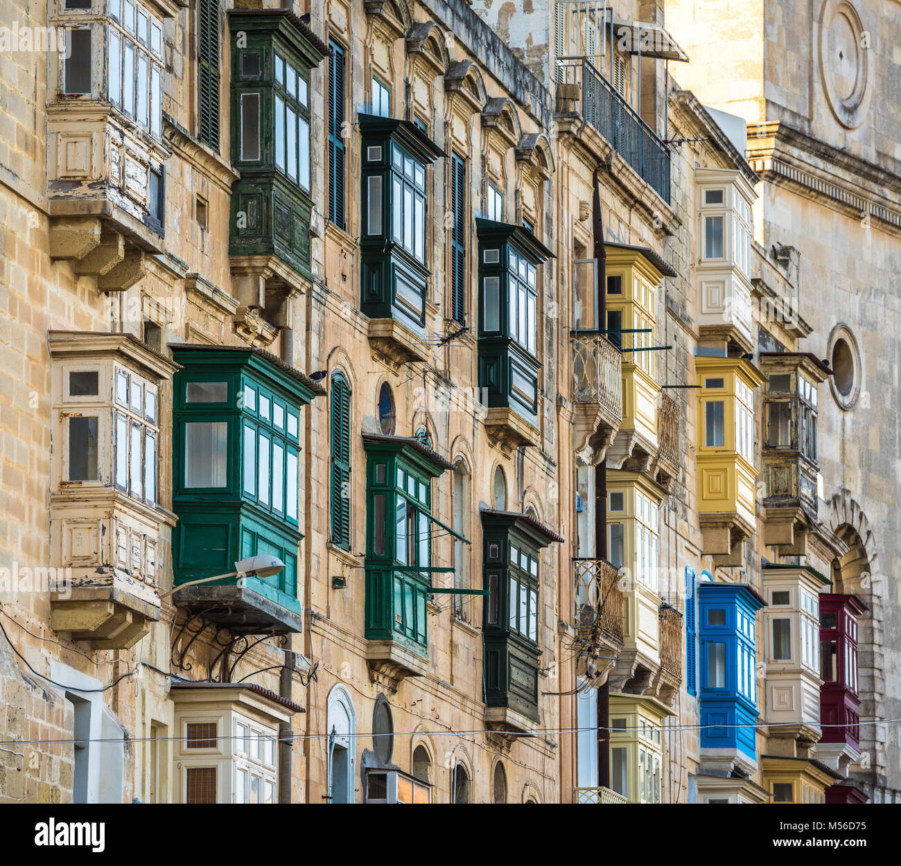 Street of Valletta with traditional balconies, Malta Stock Photo - Alamy