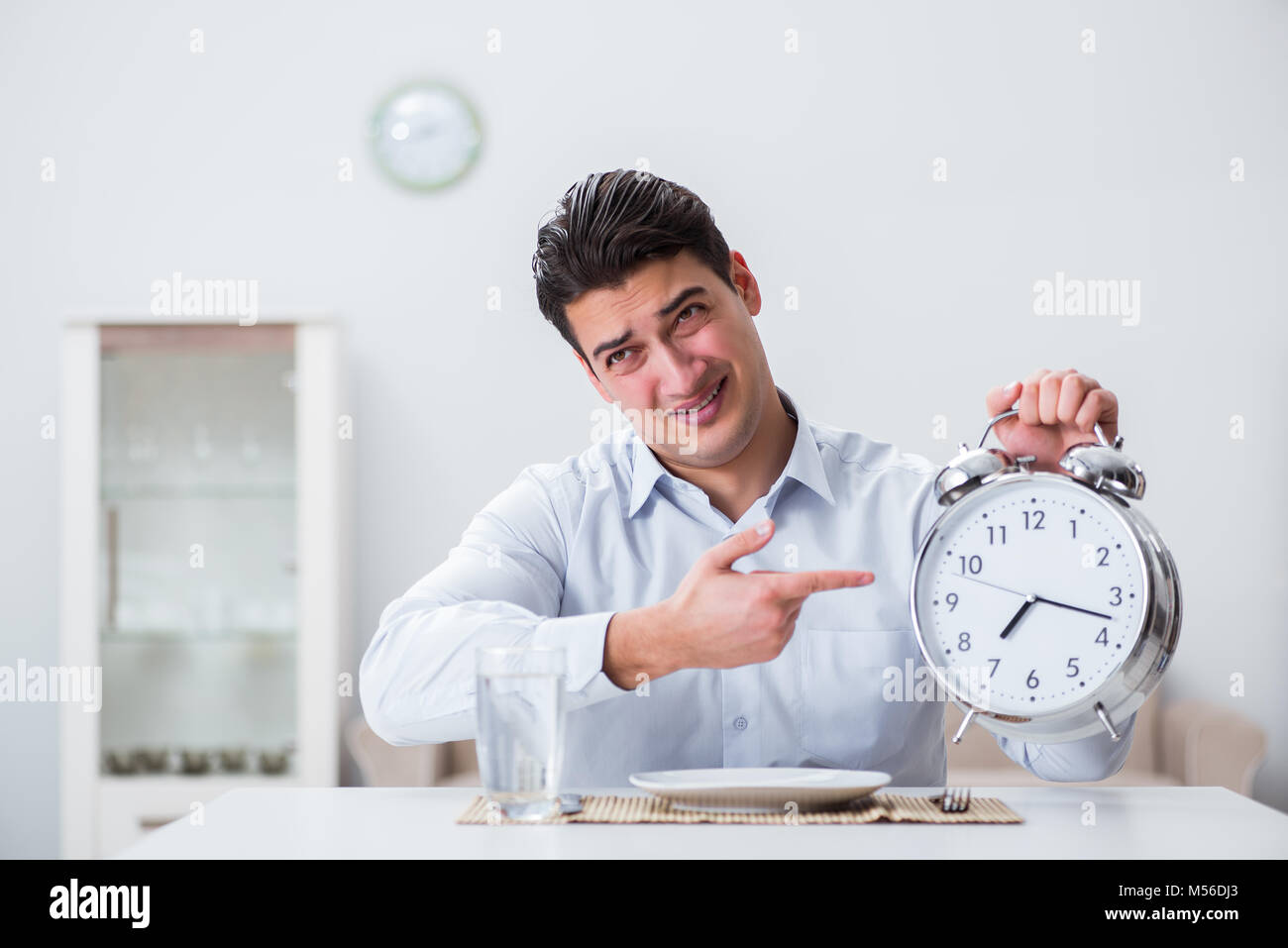 Angry man waiting food in hi-res stock photography and images - Alamy