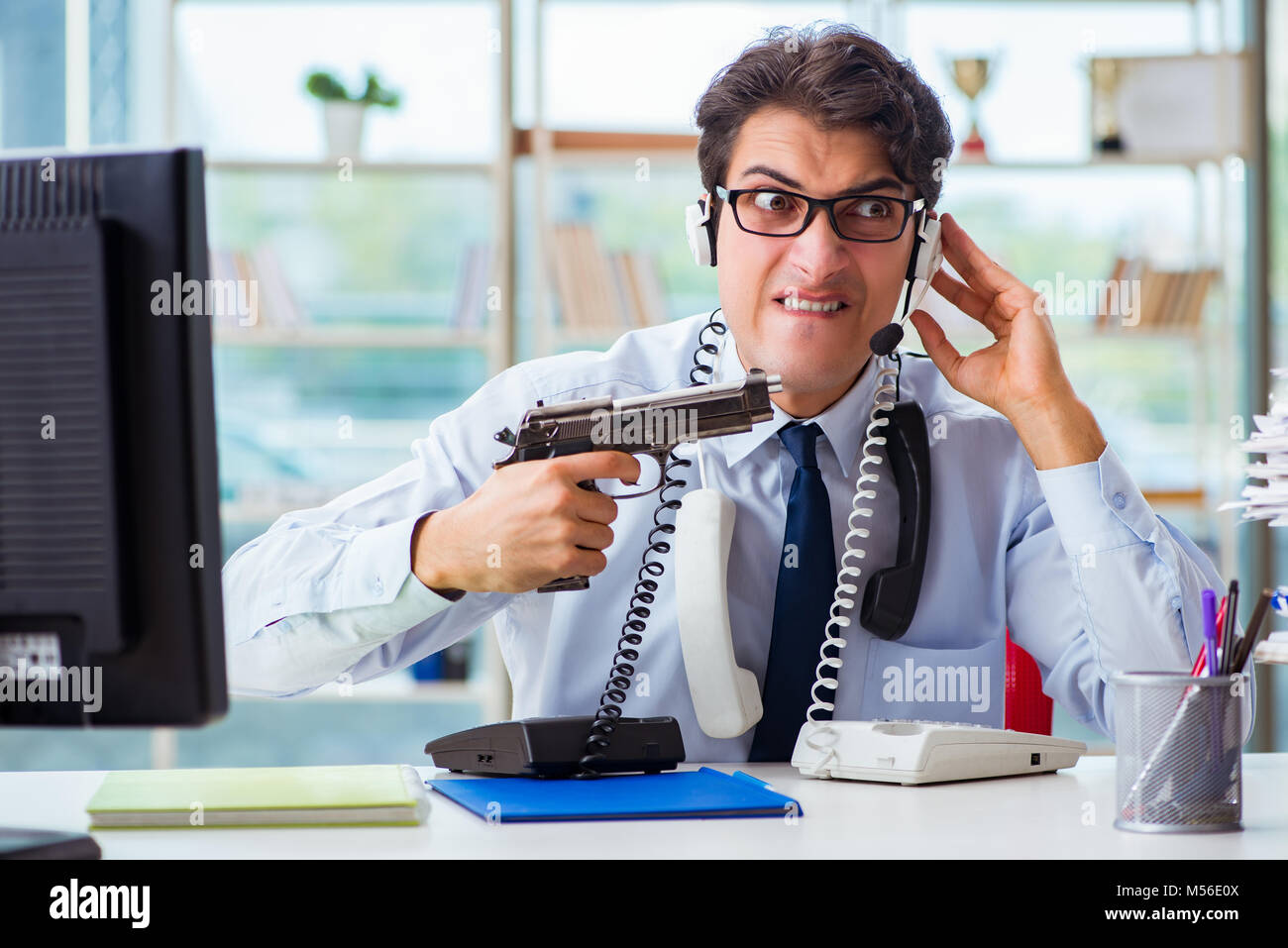 Unhappy angry call center worker frustrated with workload Stock Photo ...