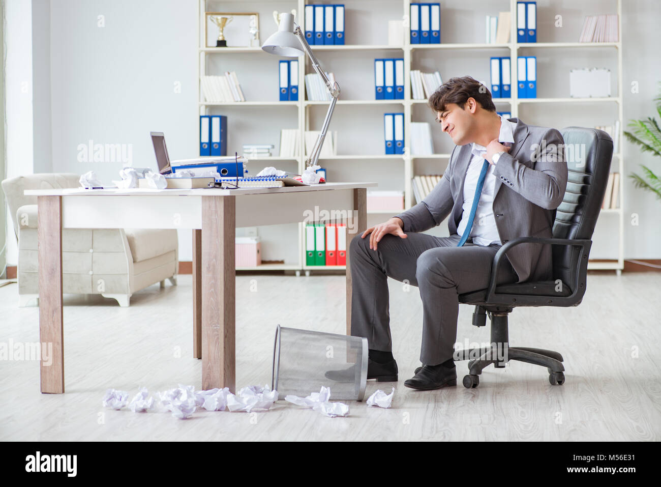 Angry businessman shocked working in the office fired sacked Stock ...