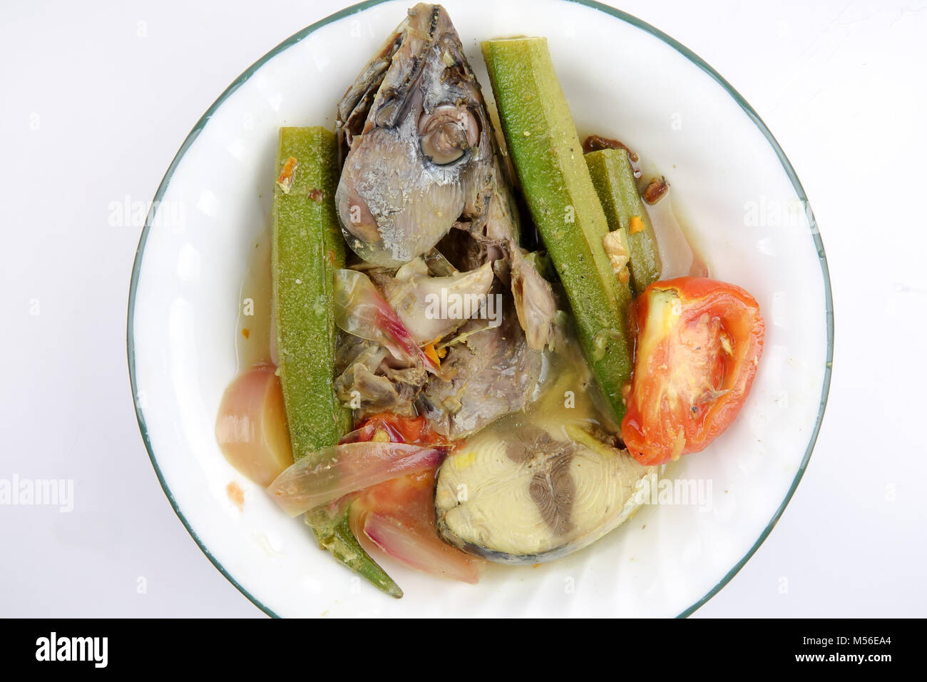 Thai Food of Tom Yum sea fish,tuna spicy soup in bowl on white ...