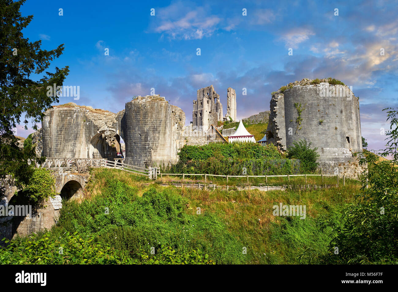 Medieval Corfe castle keep at sunrise, built in 1086 by William the ...