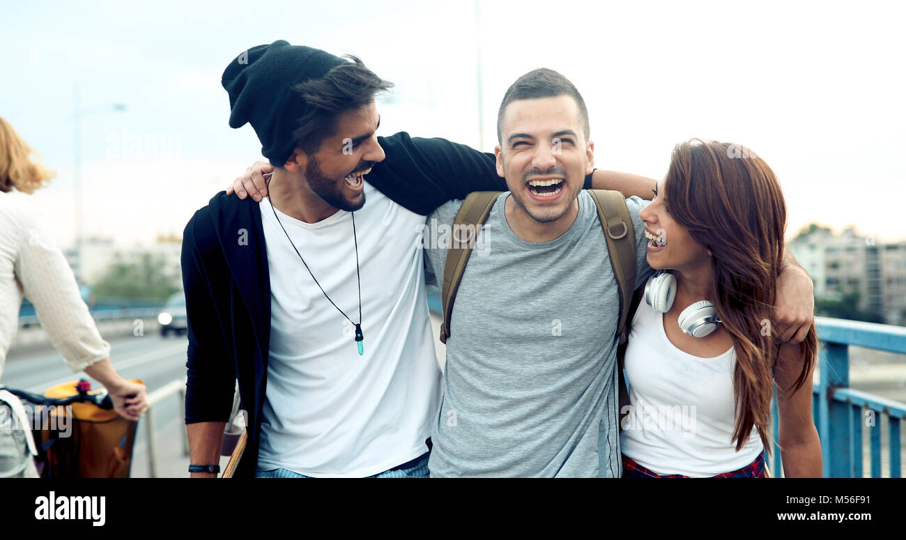 Group of happy friends hang out together Stock Photo - Alamy