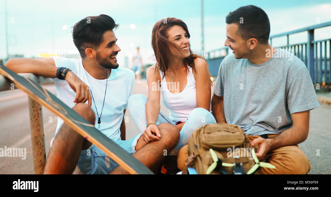 Group of happy friends hang out together Stock Photo - Alamy