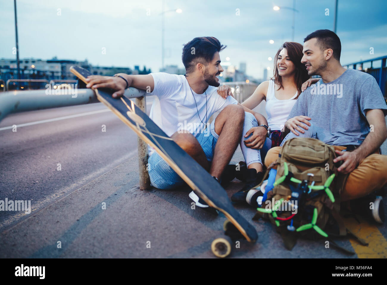 Group of happy friends hang out together Stock Photo - Alamy