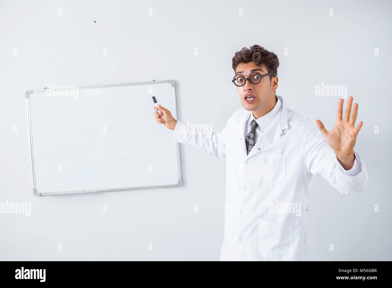 Funny doctor scientist making presentation in hospital Stock Photo - Alamy