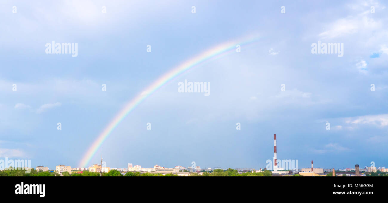 The city outdoor Factory chimneys and rainbow Stock Photo - Alamy