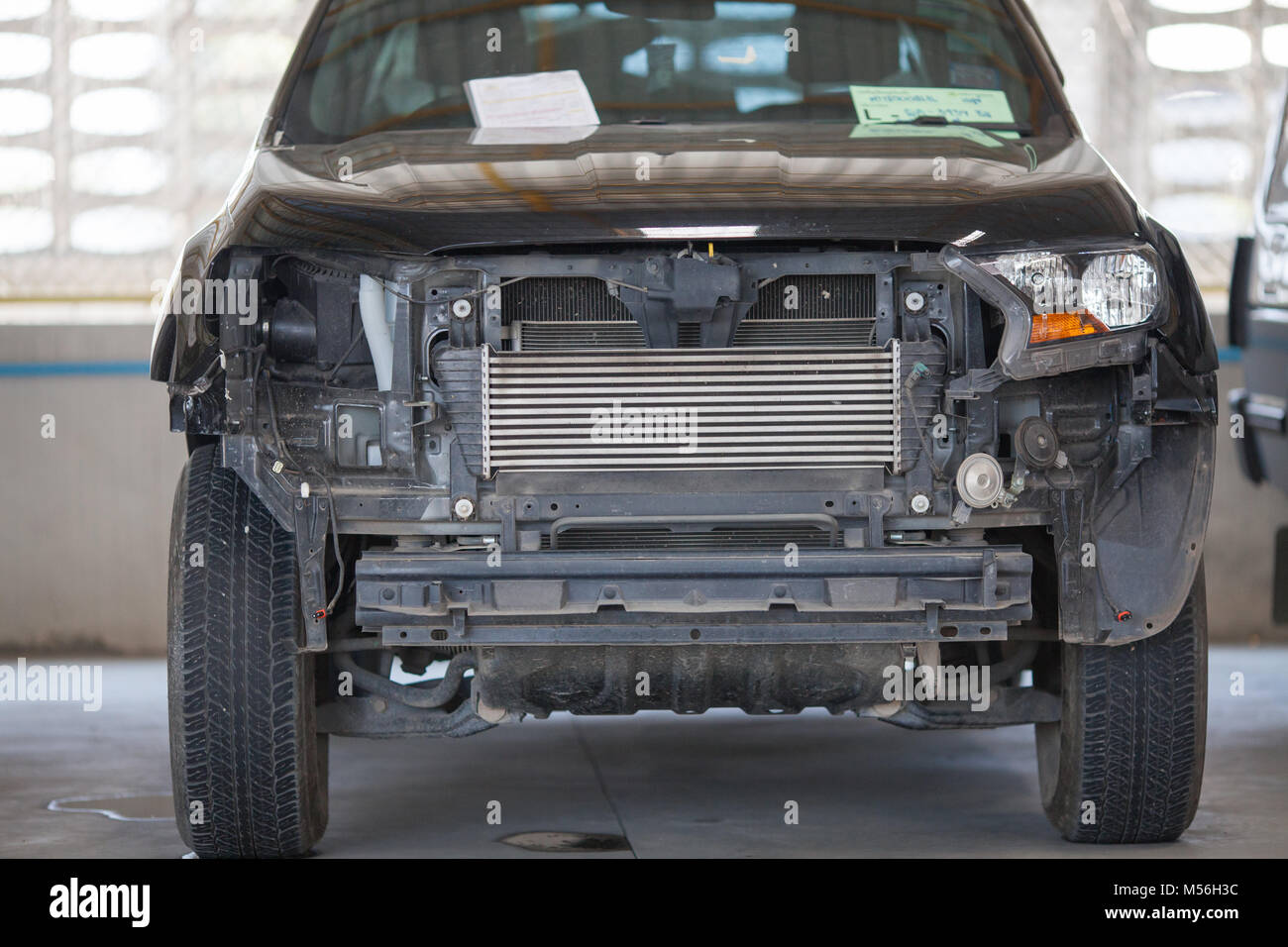 Car repair station in garage prepared for repair Stock Photo - Alamy