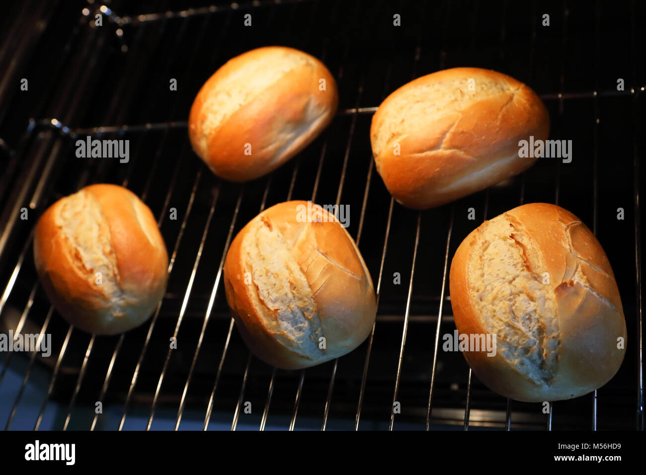 Baked rolls in a oven hi-res stock photography and images - Alamy