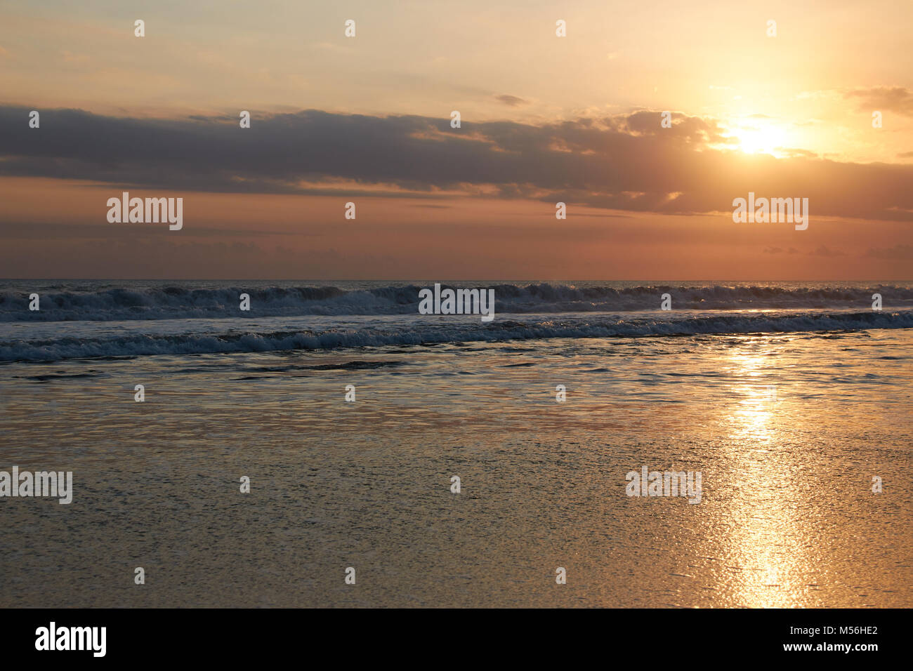 Ocean waves ripples during sunset hi-res stock photography and images ...