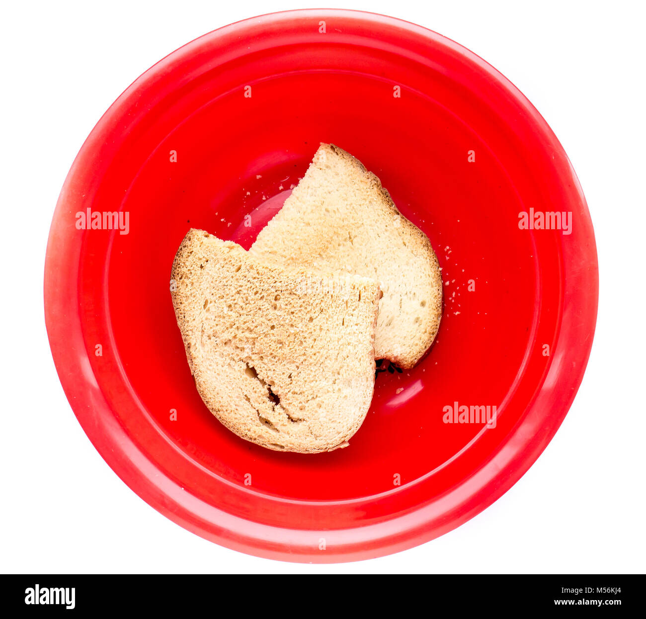 Dry Stale bread on a red plate Stock Photo - Alamy