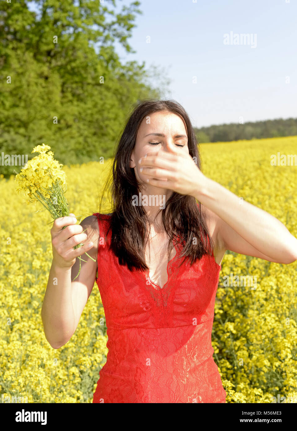young woman has hay fever Stock Photo - Alamy