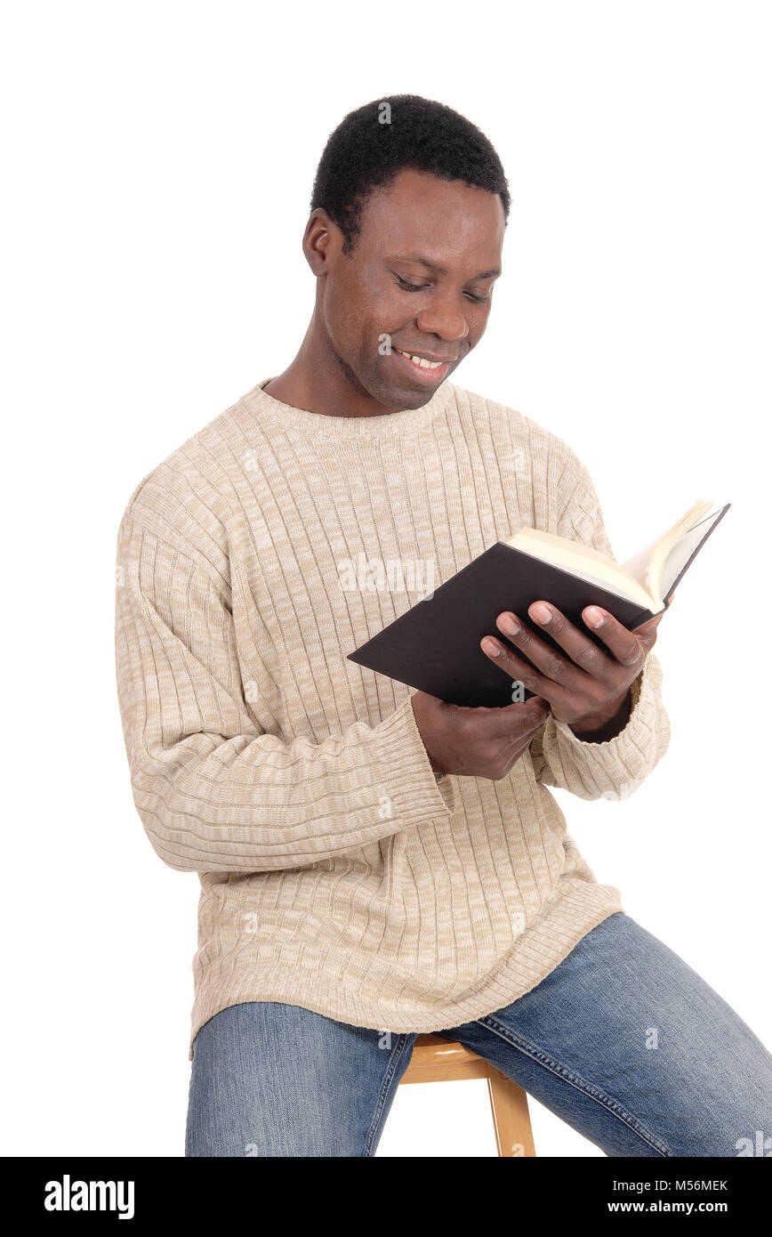 African man reading hi-res stock photography and images - Alamy