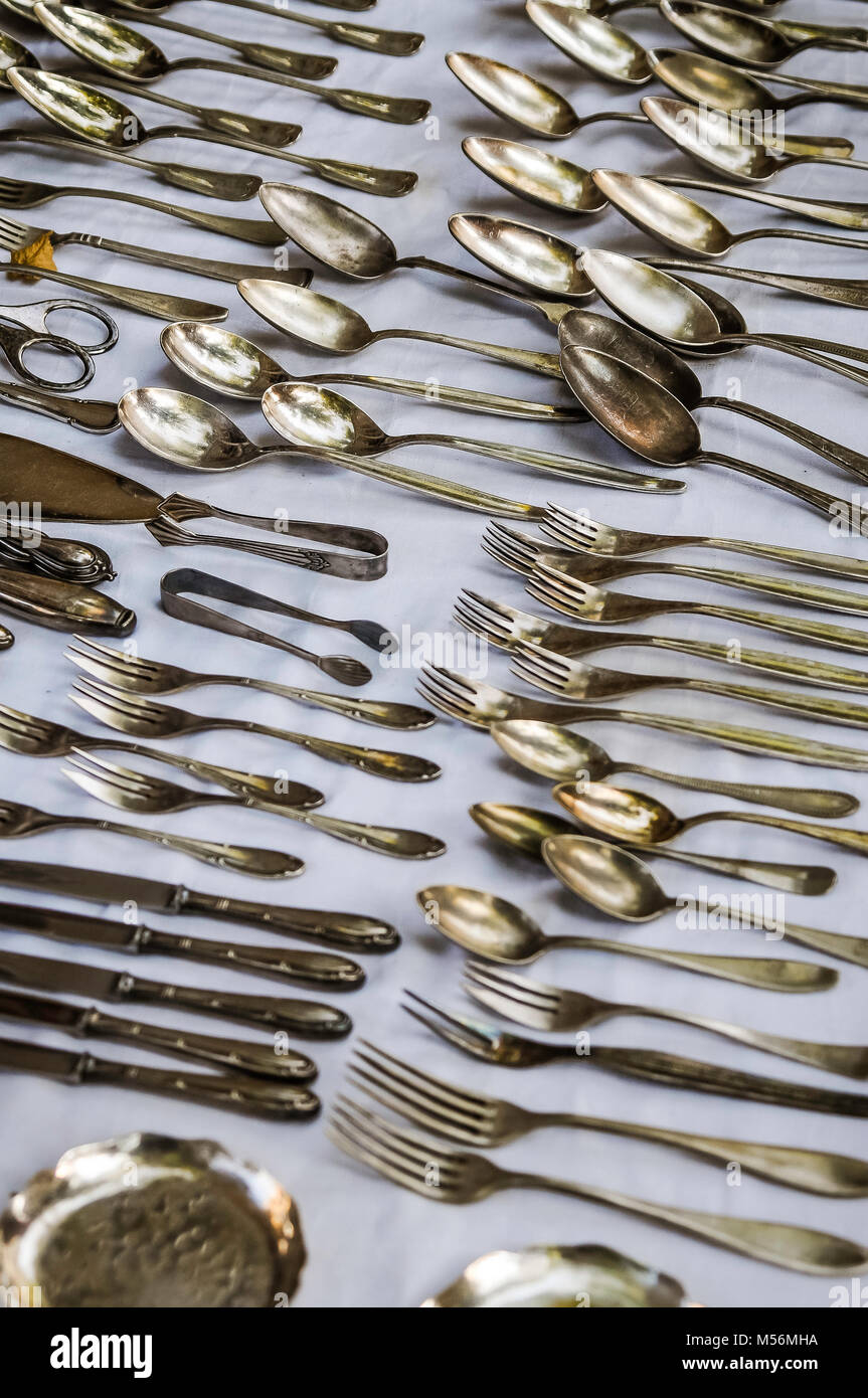 Silver spoons for sale at a flea market Stock Photo - Alamy