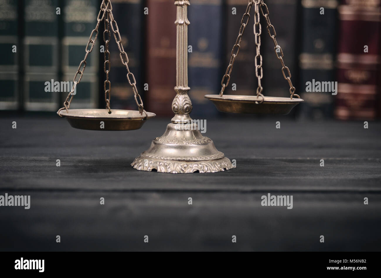Law and Justice, Legality concept, Scales of Justice on a black wooden ...