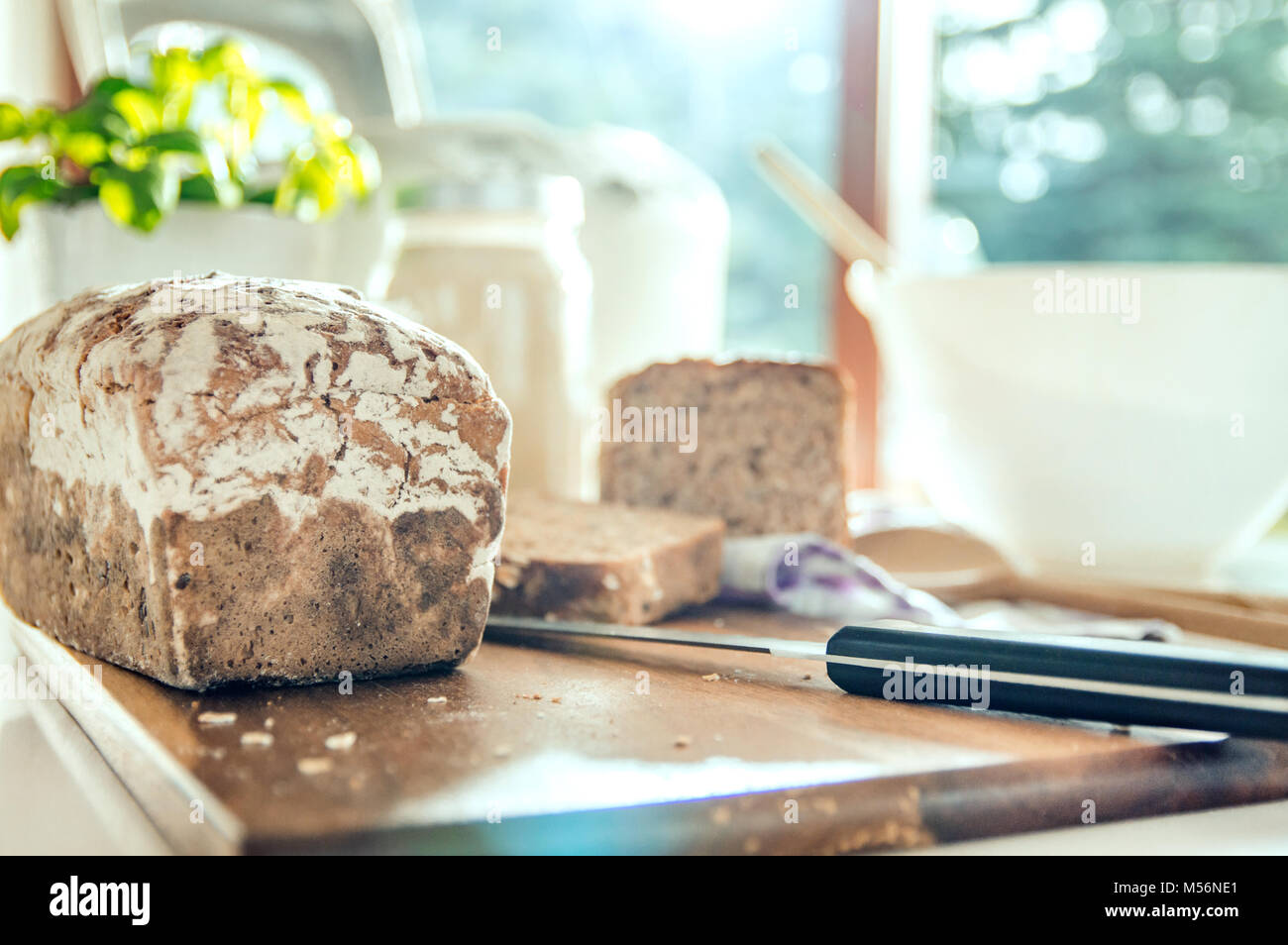 Close-up of home baked bread on modern kitchen countertop. Photo taken ...