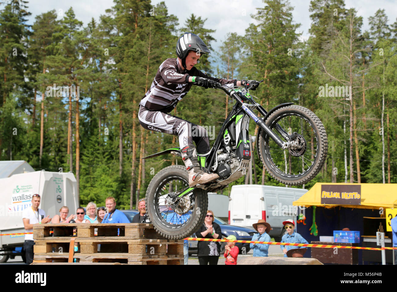 LOIMAA, FINLAND - JUNE 15, 2014: Finnish Champion Timo Myohanen gives ...