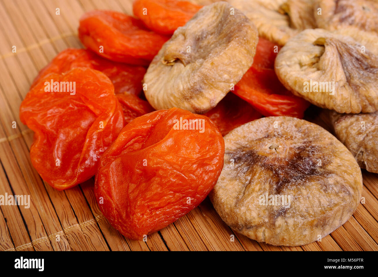 Heap of dried figs and apricots Stock Photo - Alamy