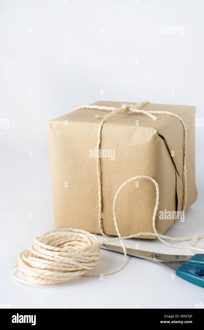 Parcel wrapped paper string hi-res stock photography and images - Alamy