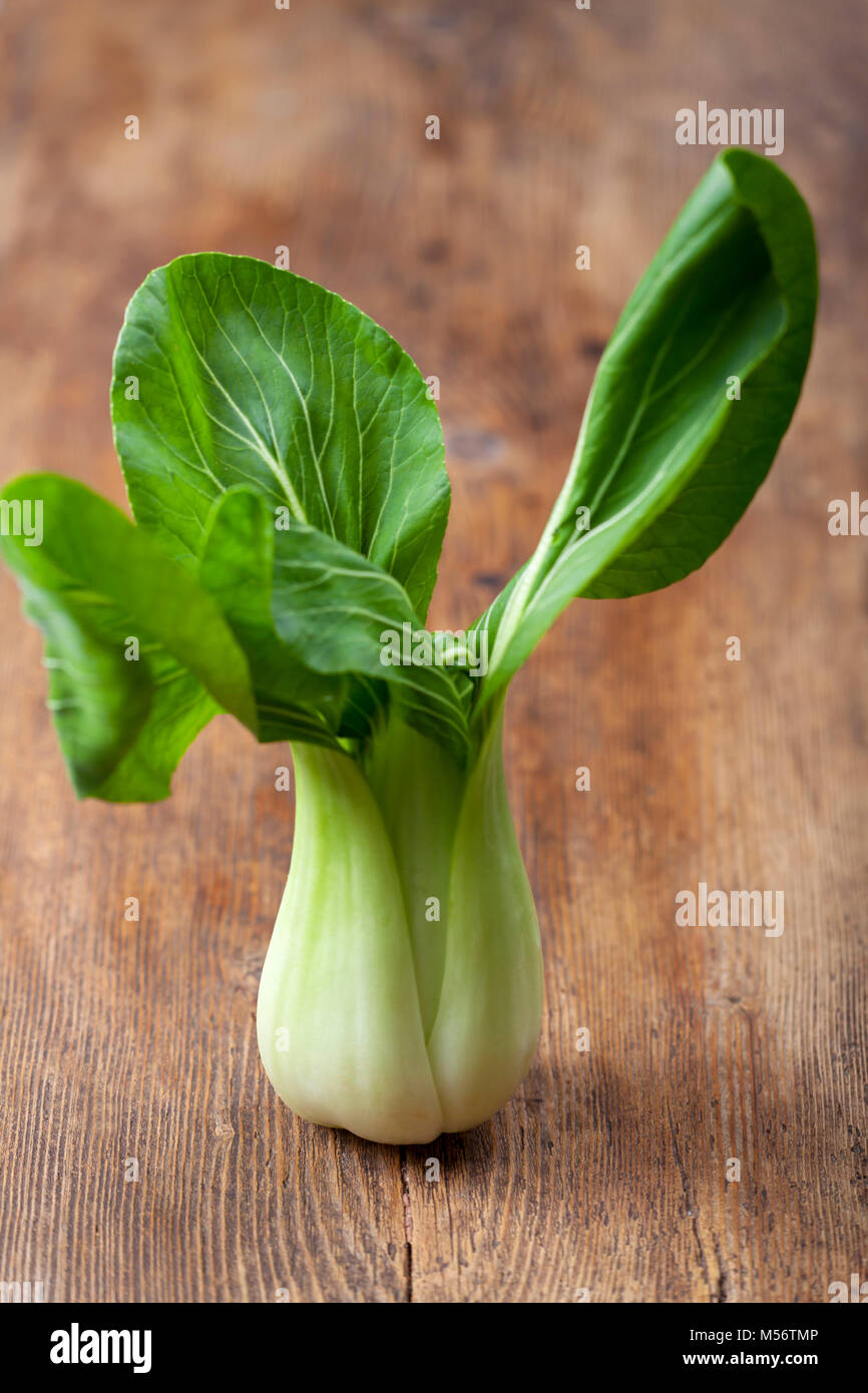 asian pak choi on dark wood Stock Photo - Alamy