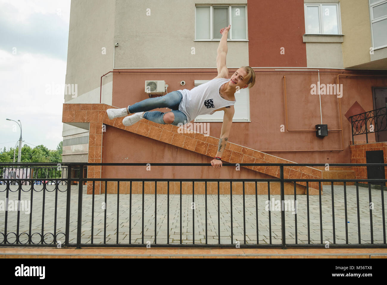 Person jump building hi-res stock photography and images - Alamy
