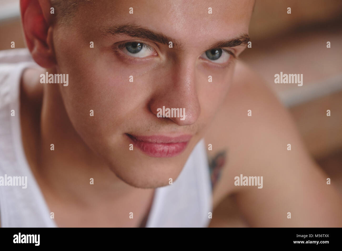 Focused look, face close-up portrait young man Stock Photo - Alamy