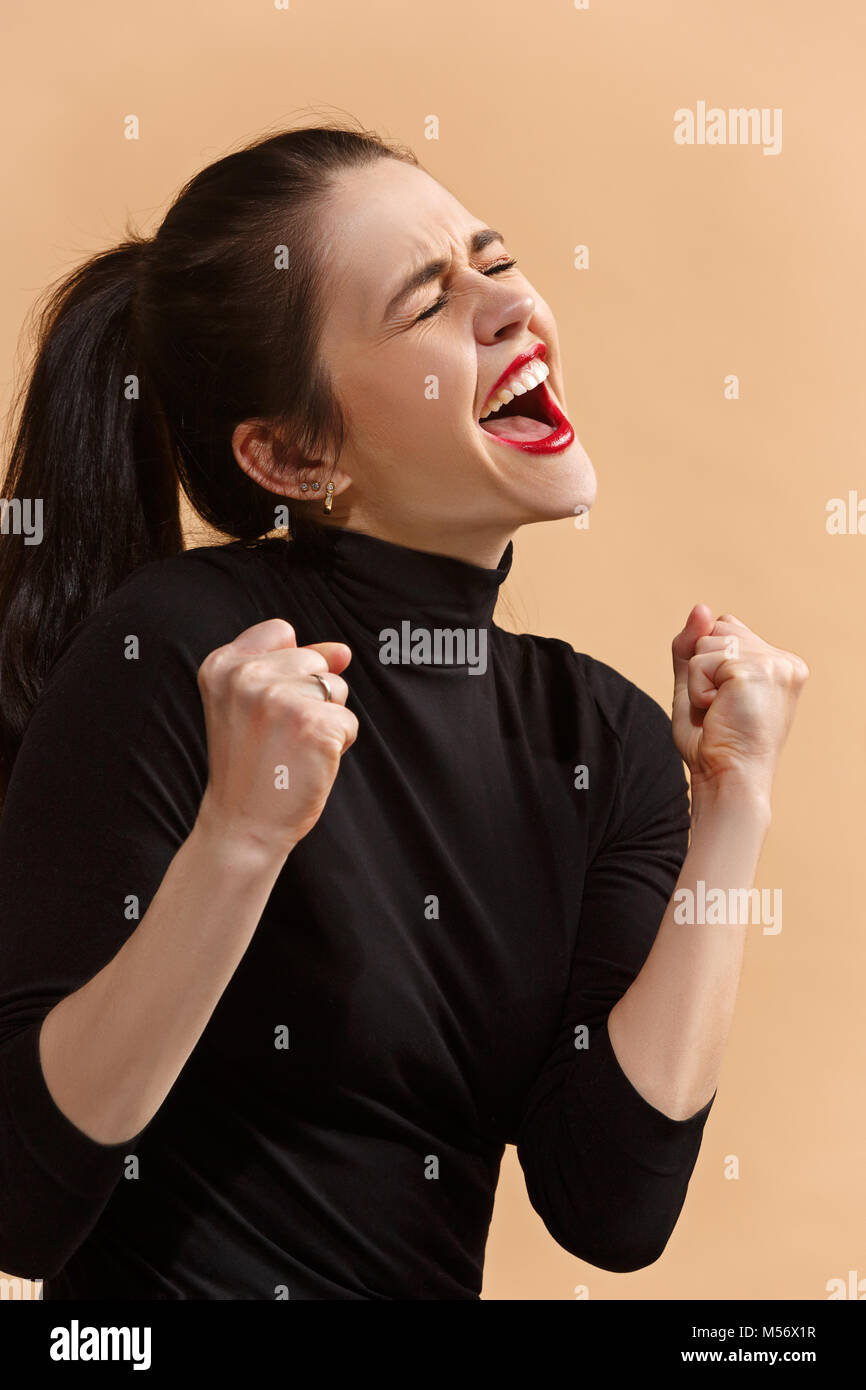 Winning success woman happy ecstatic celebrating being a winner ...
