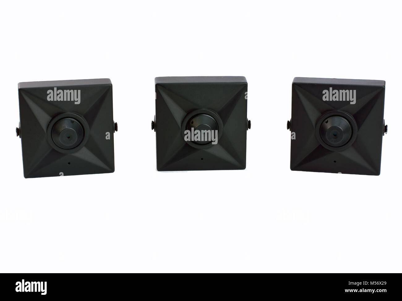 Mini electronic surveillance cameras on white background Stock Photo ...