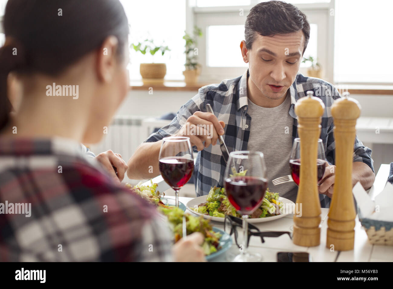 Happy man relaxing with his friends Stock Photo - Alamy