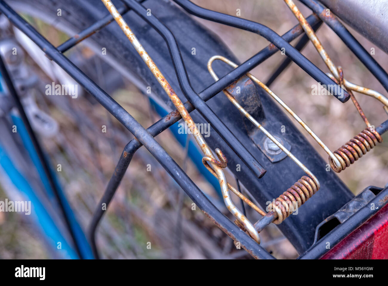 Rusted luggage rack on an old bicycle Stock Photo - Alamy
