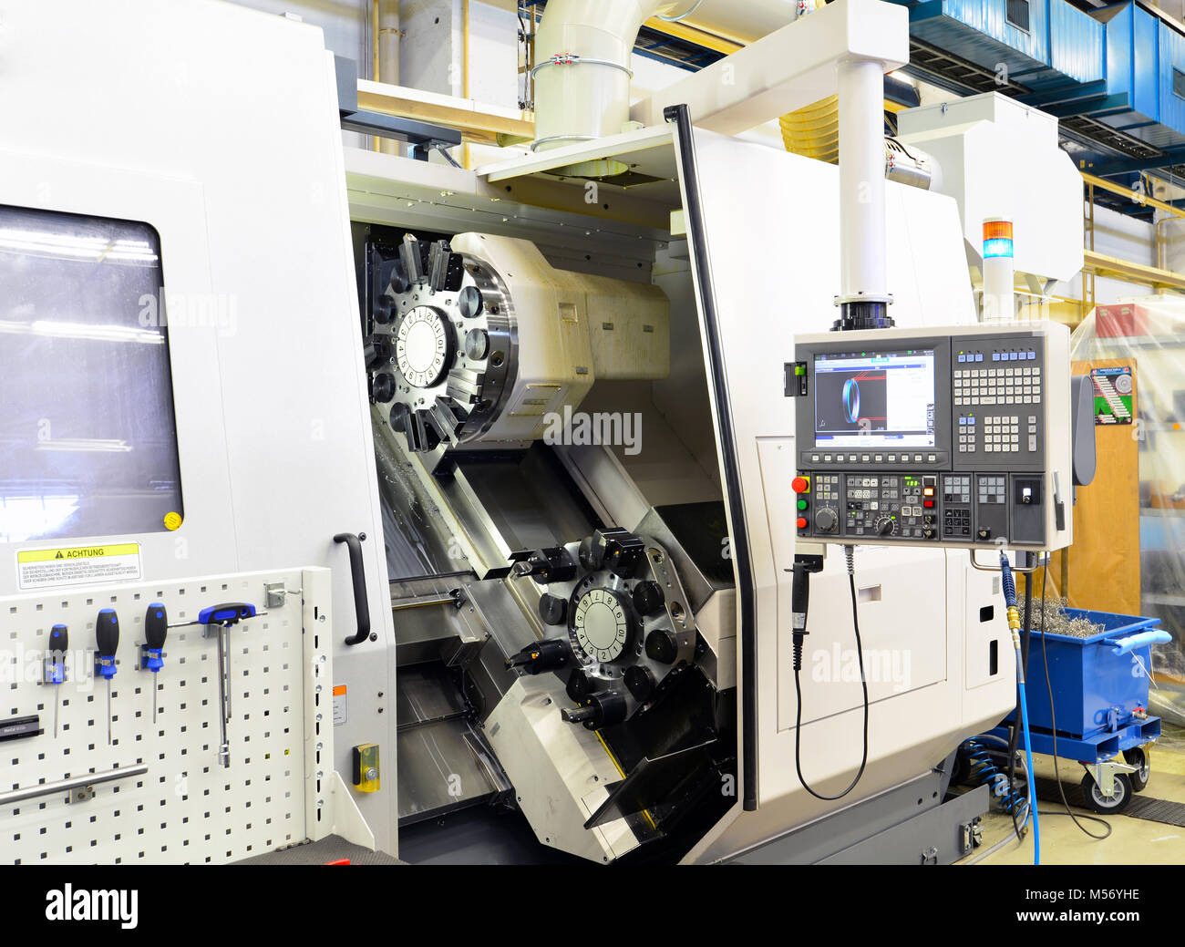 modern cnc machine for production and processing in mechanical ...