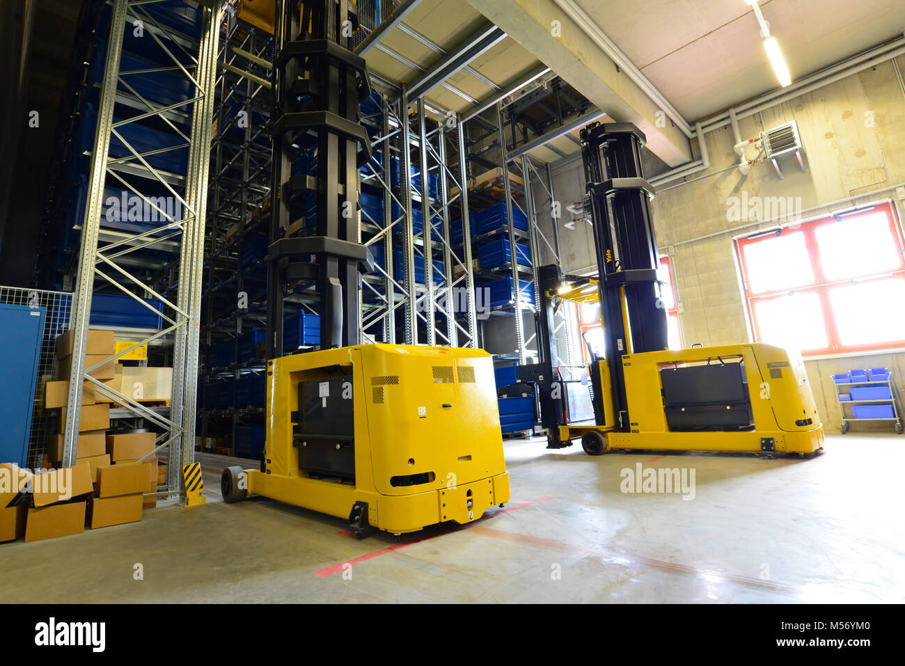 high bay rack in warehouse with forklift in industrial building Stock ...