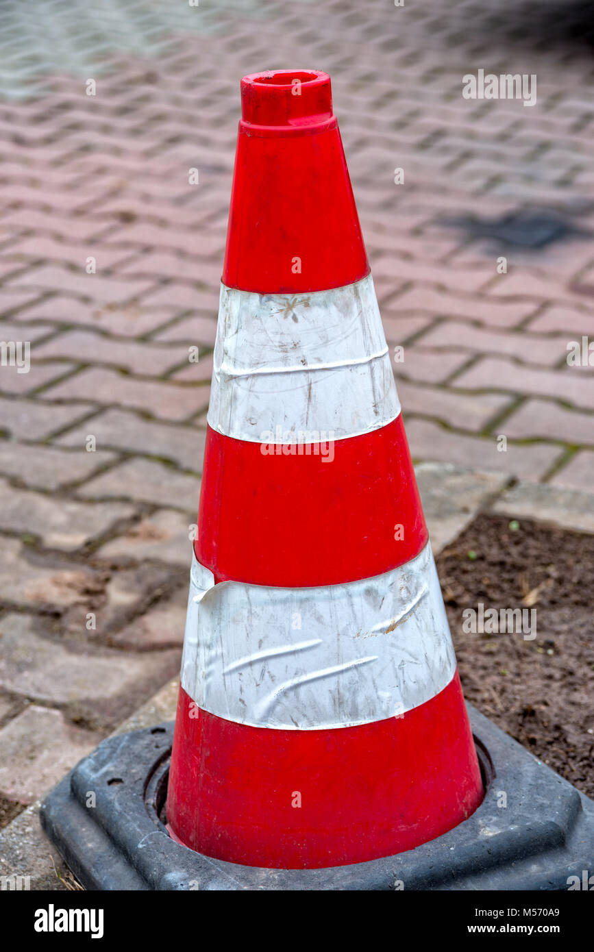 Red white cone to warn the traffic Stock Photo - Alamy
