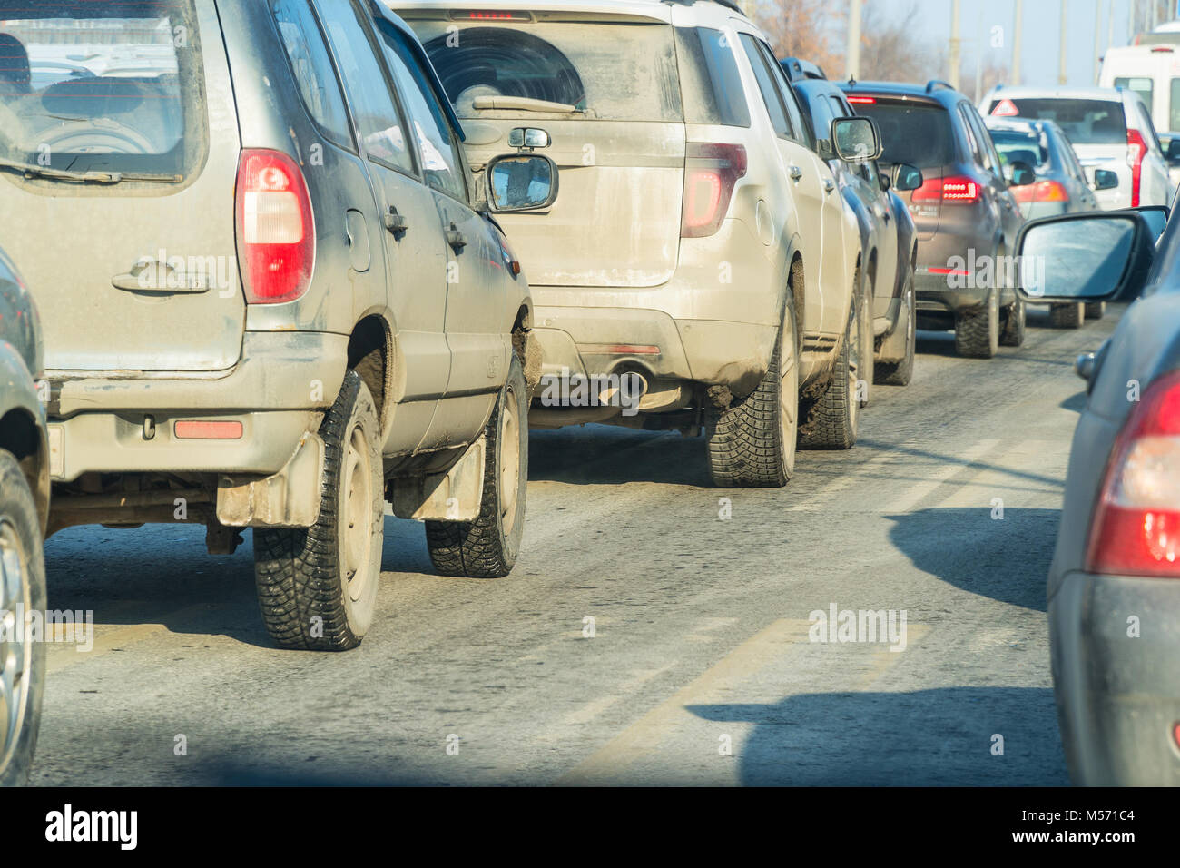Cars standing in a traffic jam on a city street Stock Photo - Alamy