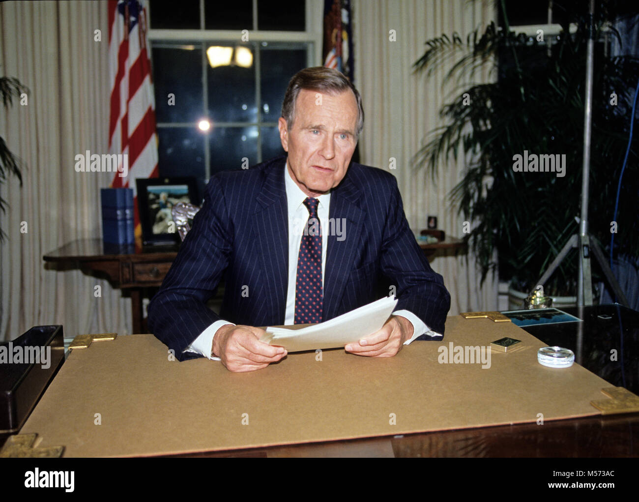 United States President George H.W. Bush poses for photographers after ...