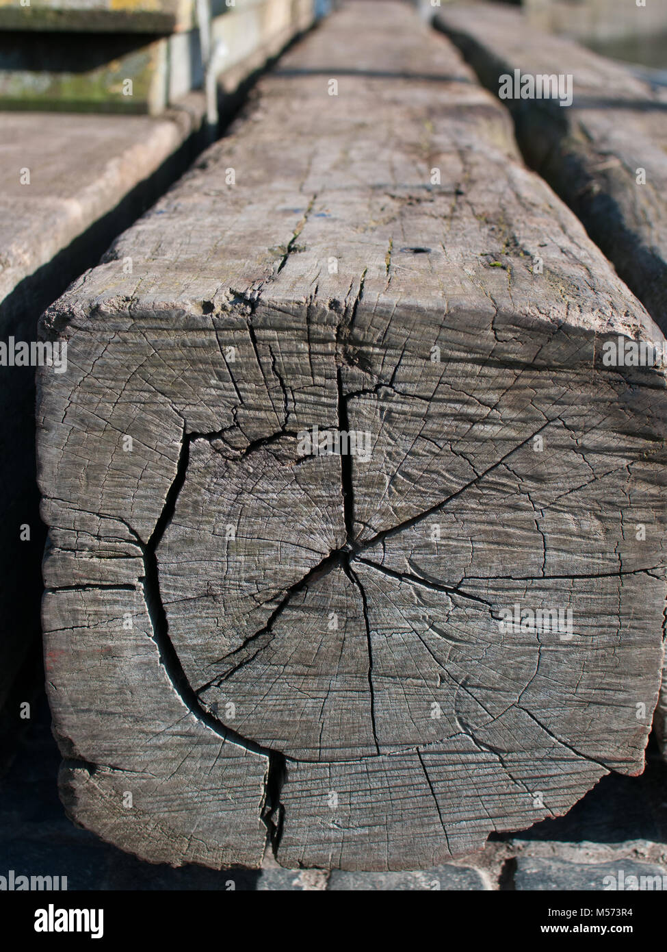 long wooden boulder Stock Photo - Alamy
