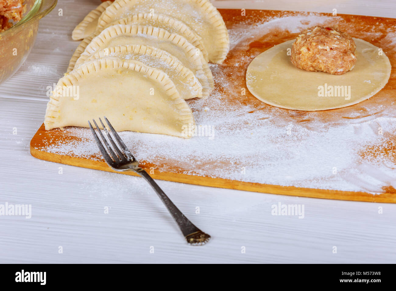 Traditional crimean tatar dish- cheburek on wooden background is ready ...